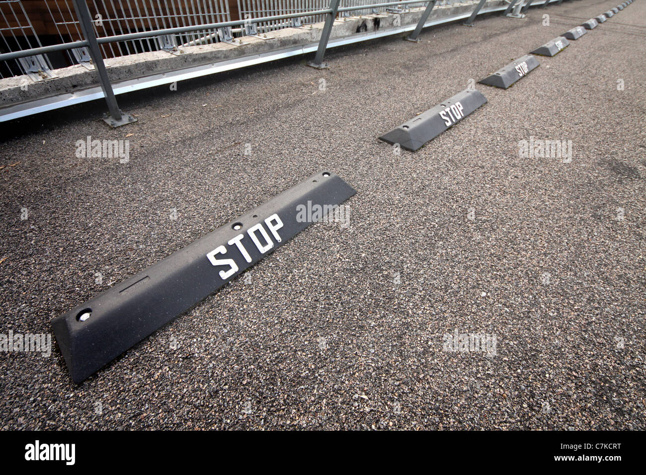 stop sign on a asphalt road surface Stock Photo - Alamy
