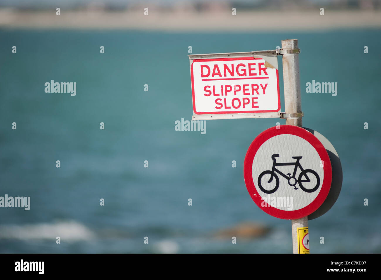 Danger slippery slope sign hi-res stock photography and images - Alamy