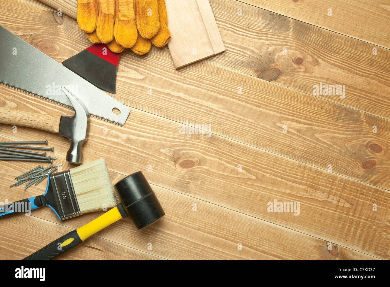 Different tools on a wooden background Stock Photo - Alamy