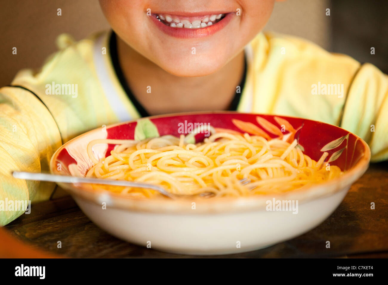 Boy and Spaghetti Bowl Stock Photo - Alamy