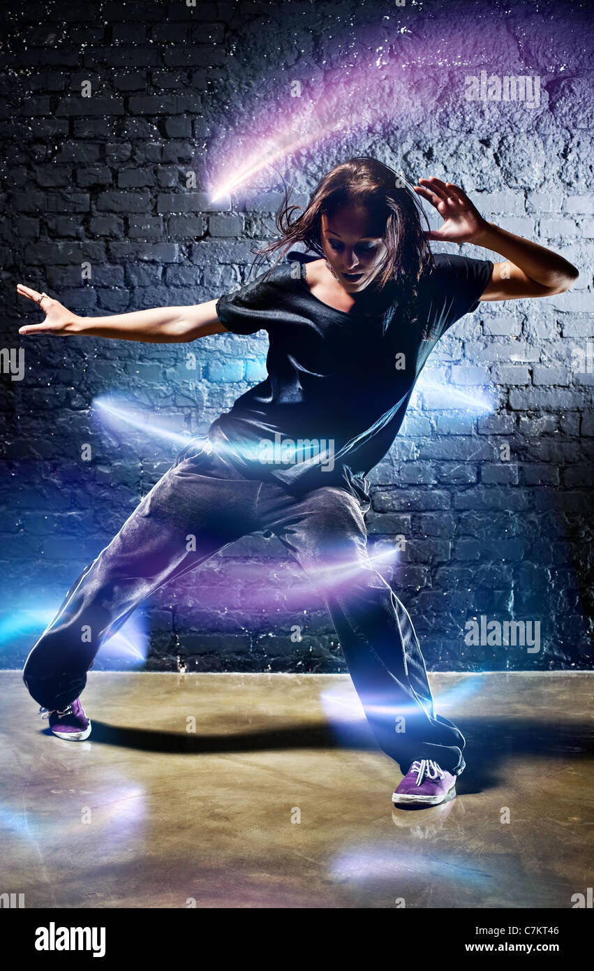 Young woman dancer. With lights effect Stock Photo - Alamy