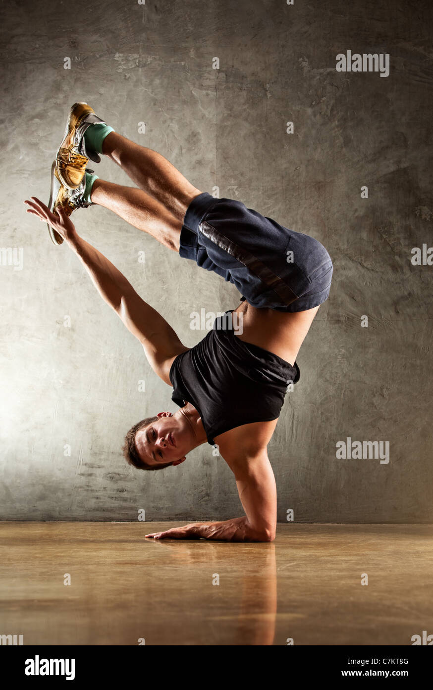 Young strong man break dance Stock Photo - Alamy