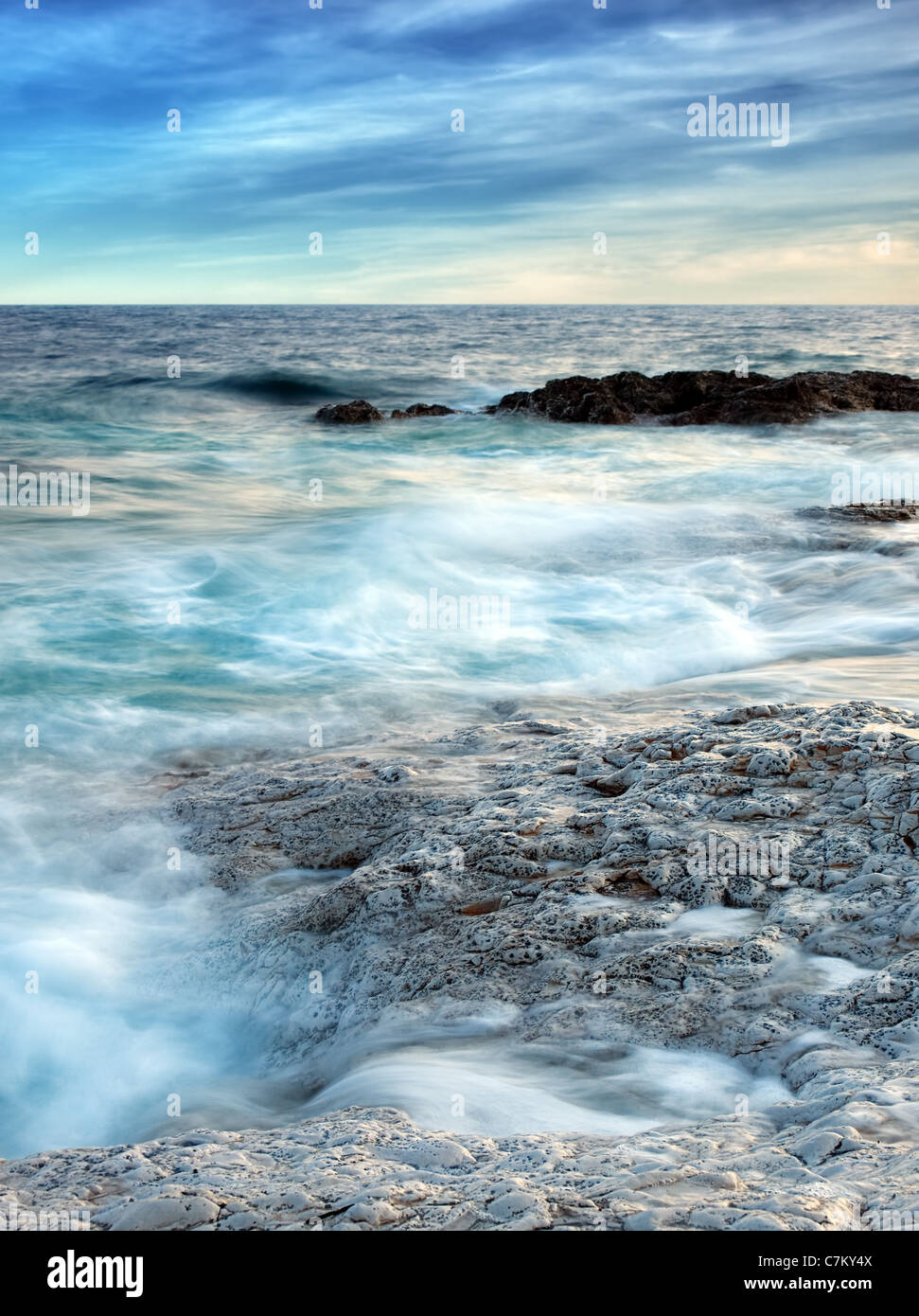 Rocky Adriatic beach splashed by waves Stock Photo - Alamy