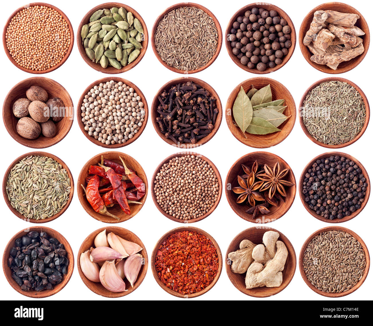 Wooden bowls full of different spices isolated on white background ...
