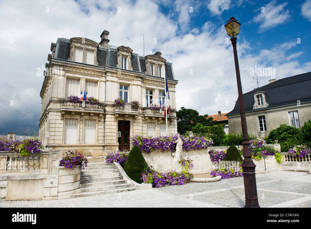 City hall with memorial war 1 statue in Montbron Stock Photo - Alamy