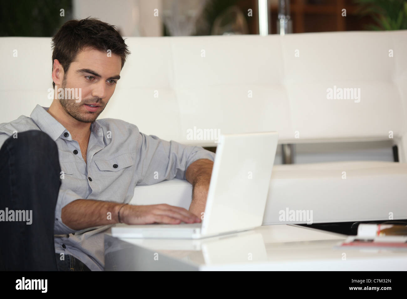 Man checking his emails Stock Photo - Alamy