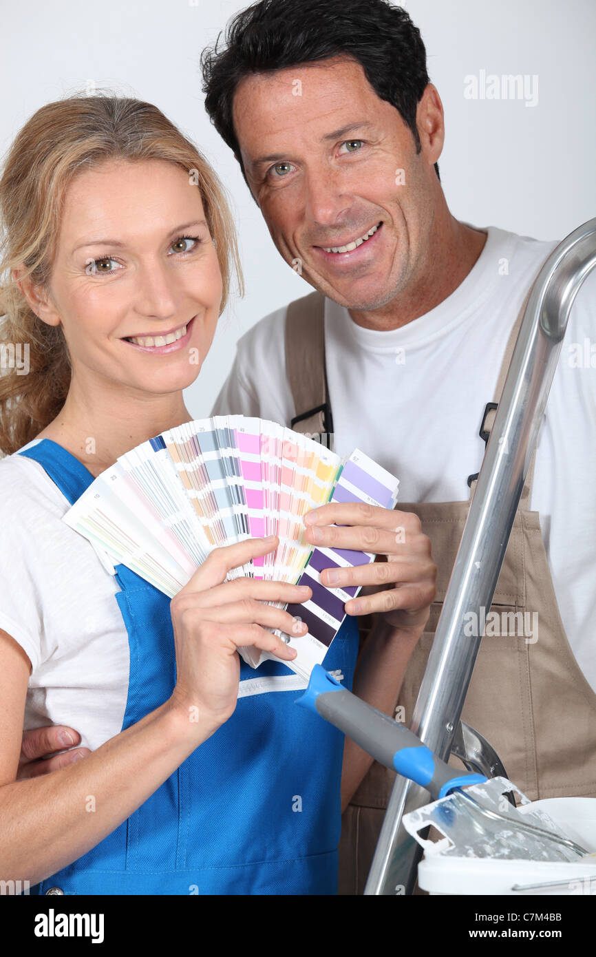 Couple choosing colours Stock Photo - Alamy