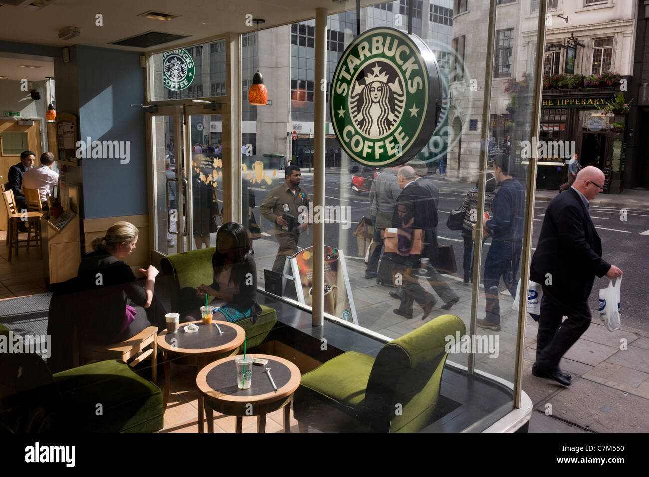 A branch of the American coffee chain, Starbucks in Fleet Street ...
