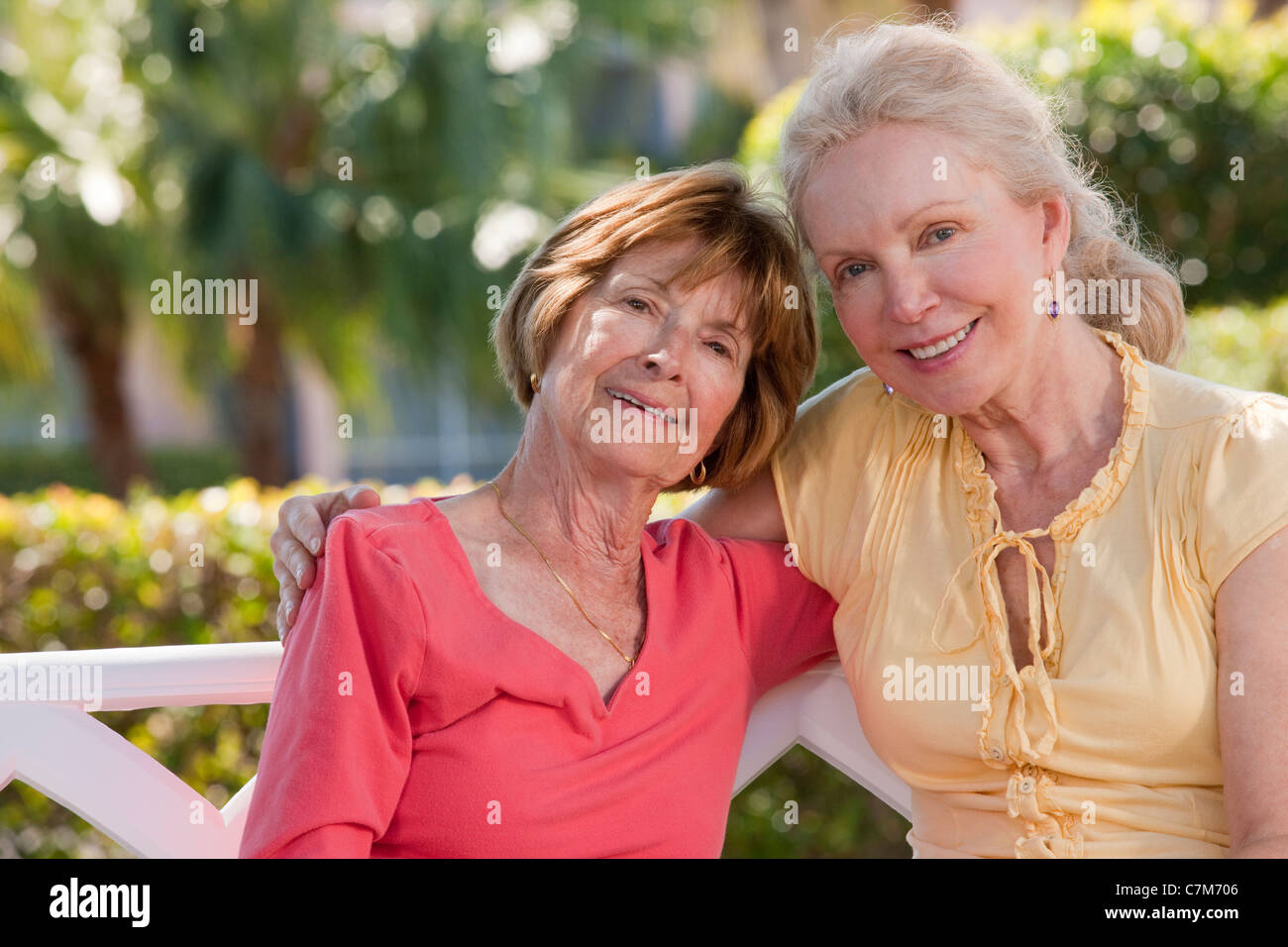 Portrait of two women smiling Stock Photo - Alamy