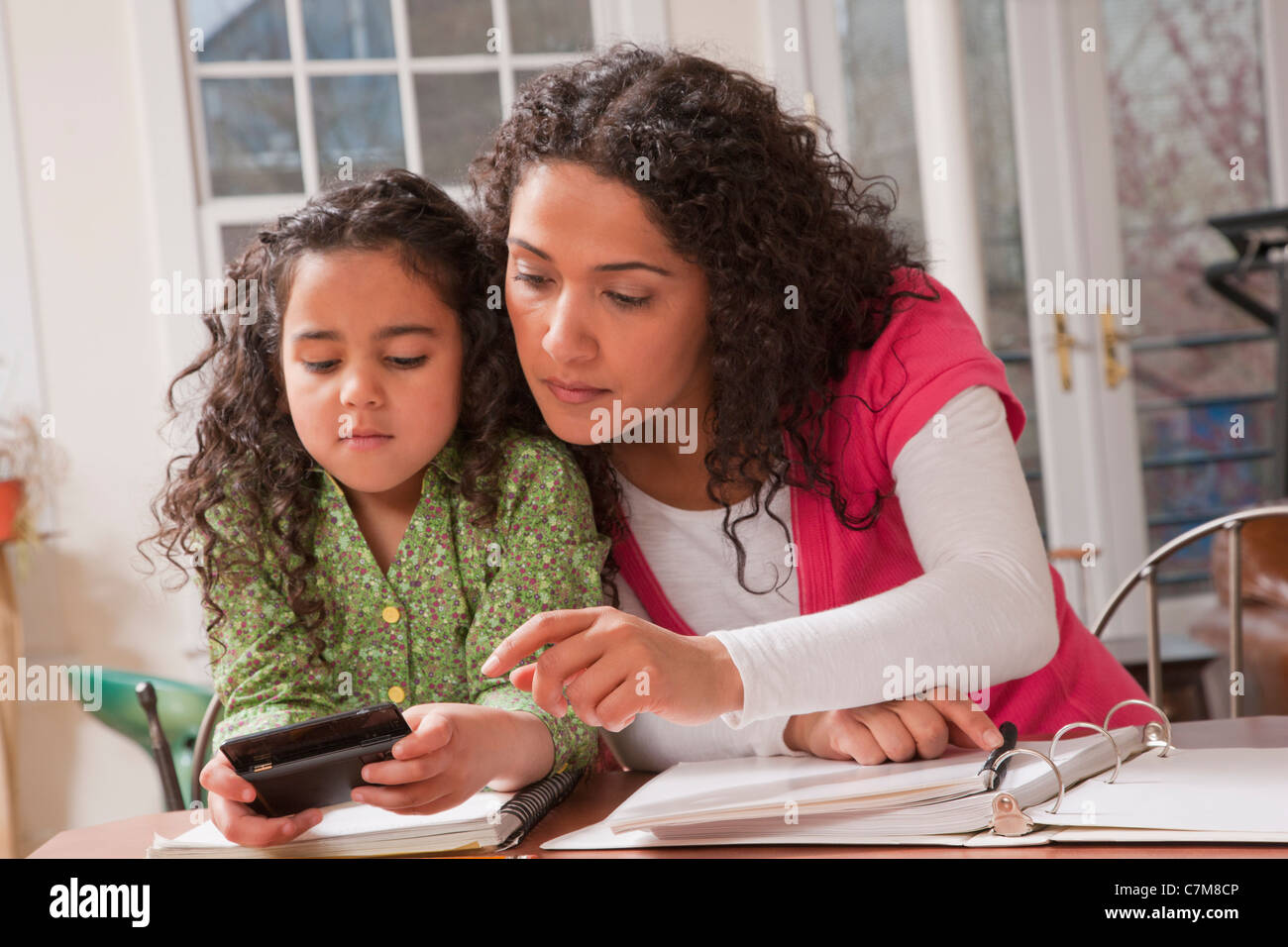 Helping hispanic woman female women hi-res stock photography and images ...
