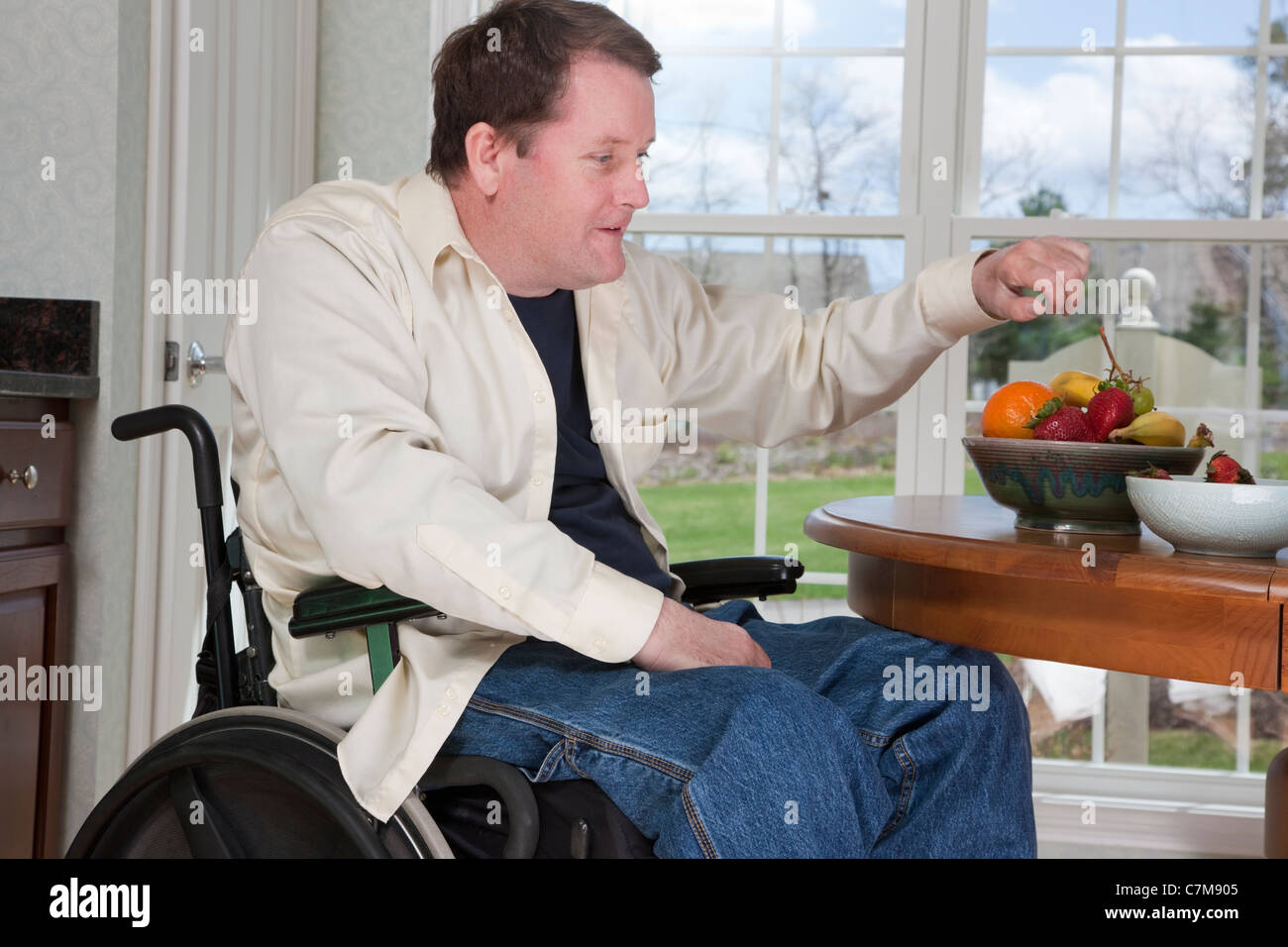 Handicapped man eating hi-res stock photography and images - Alamy