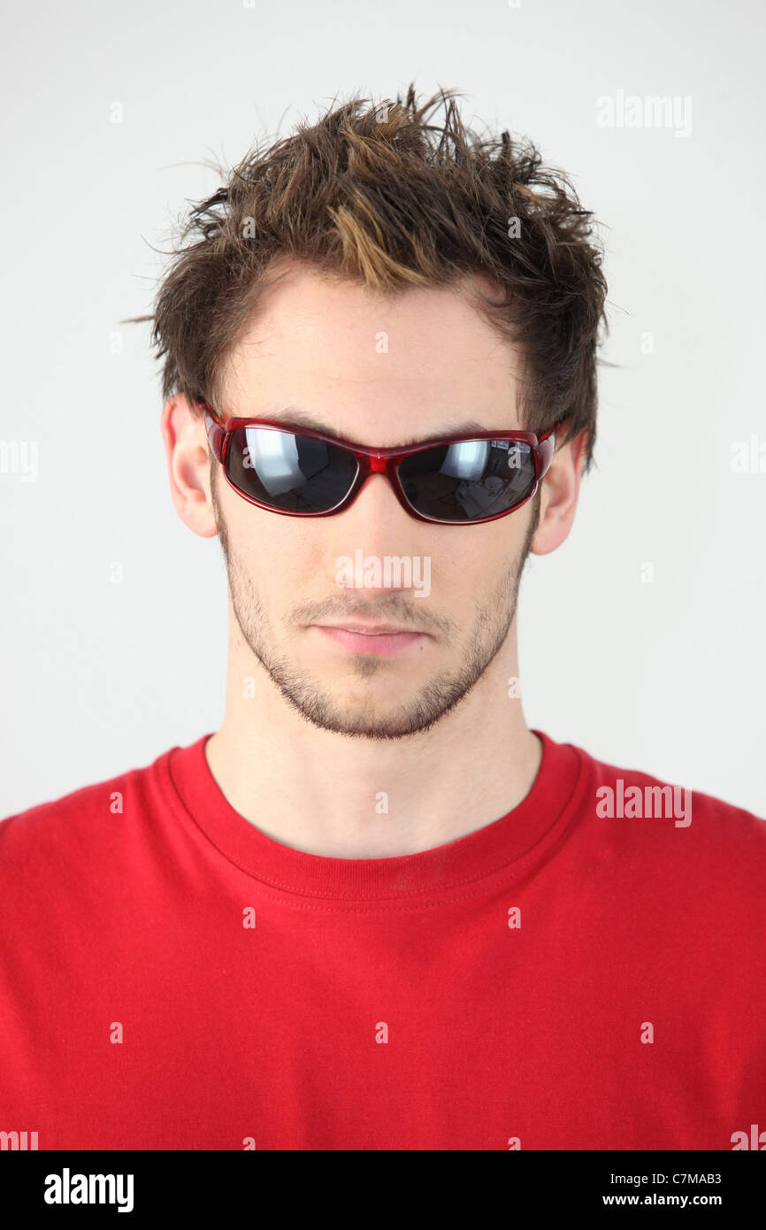 Red rim sunglasses hi-res stock photography and images - Alamy