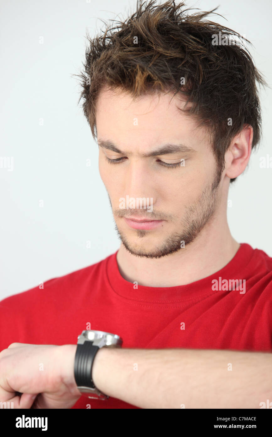 Checking minute hi-res stock photography and images - Alamy