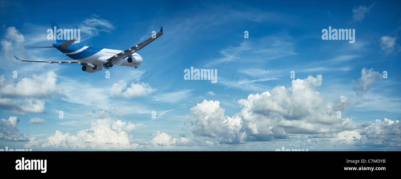 Jet plane in flight. Panoramic composition Stock Photo - Alamy