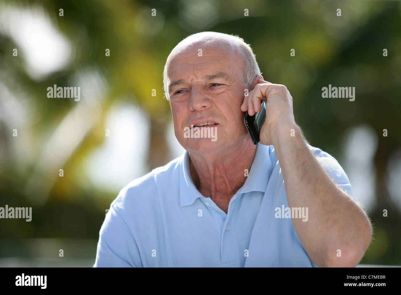 Grandfather cellphone haired grey hi-res stock photography and images ...