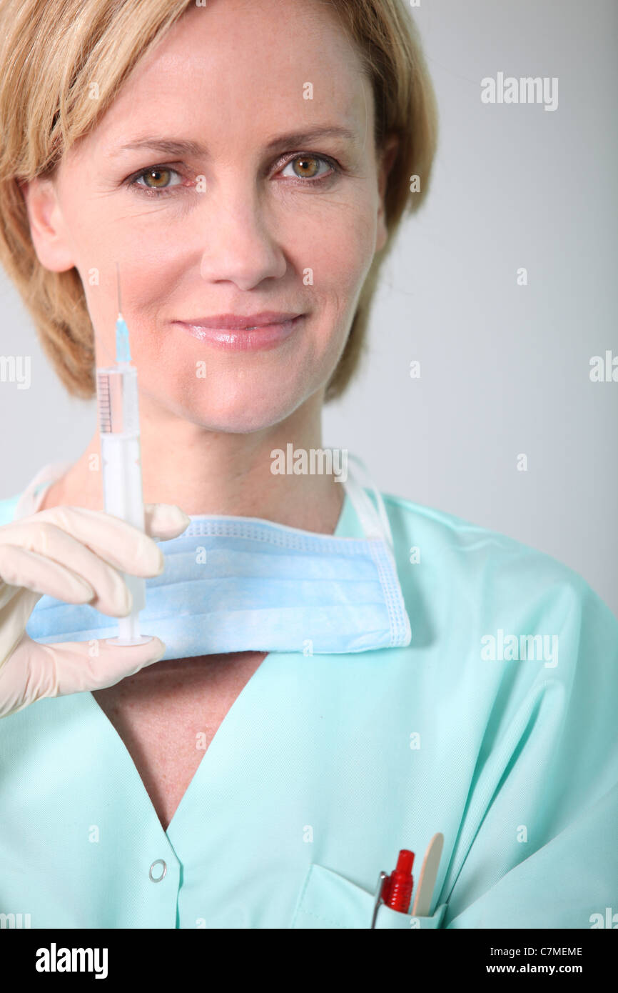 Nurse with an injection Stock Photo - Alamy