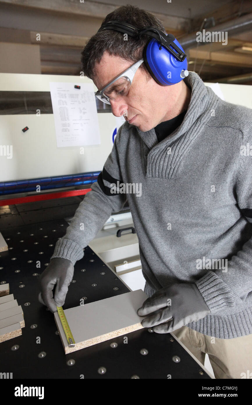 craftsman working in a factory Stock Photo - Alamy