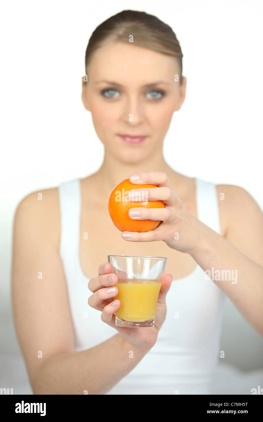 Squeezing orange juice pouring glass hi-res stock photography and images - Alamy