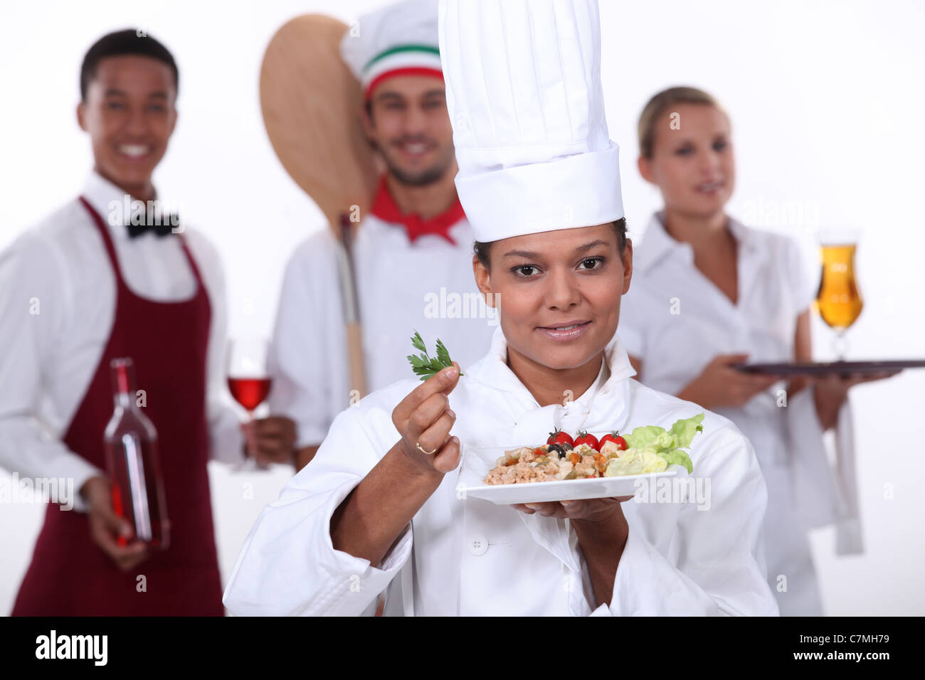 female chef presenting a plate Stock Photo - Alamy