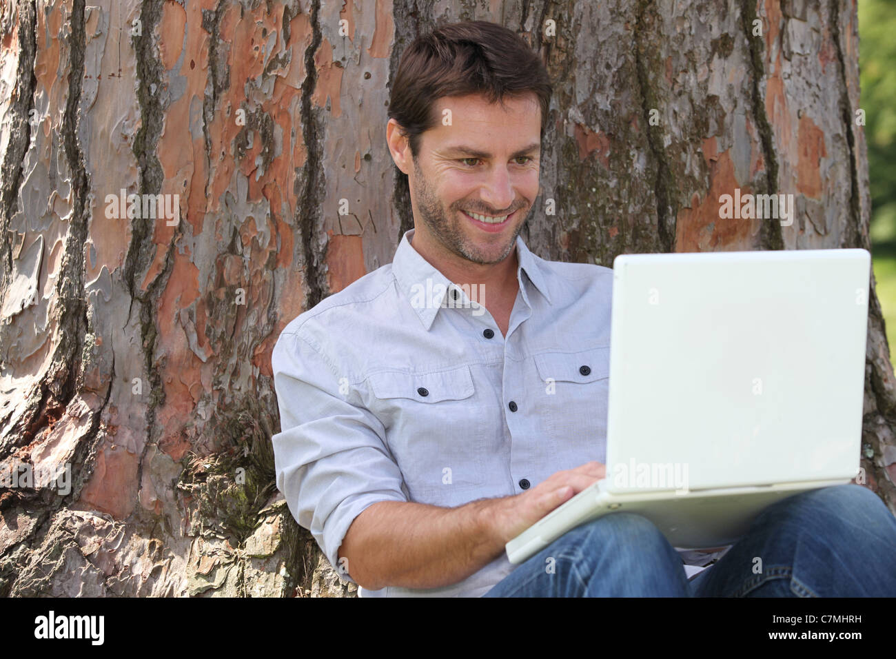 portrait of a man with laptop Stock Photo - Alamy