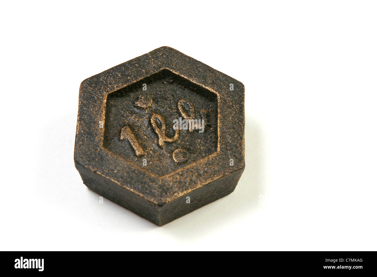 Pattern weights on a white background Stock Photo - Alamy