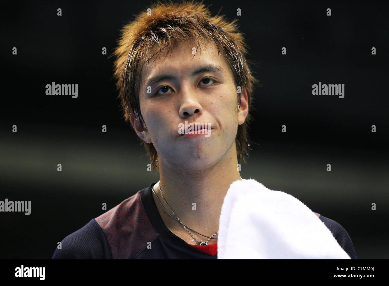 Kenichi Tago (JPN) performs during the YONEX Open Japan 2011, Men's ...