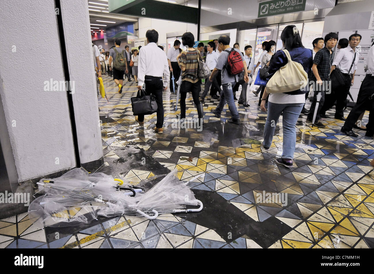 Many umbrella broken by the strong wind is seen around the Shibuya ...