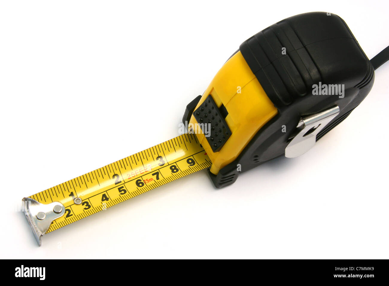 A measuring tape on white background Stock Photo - Alamy