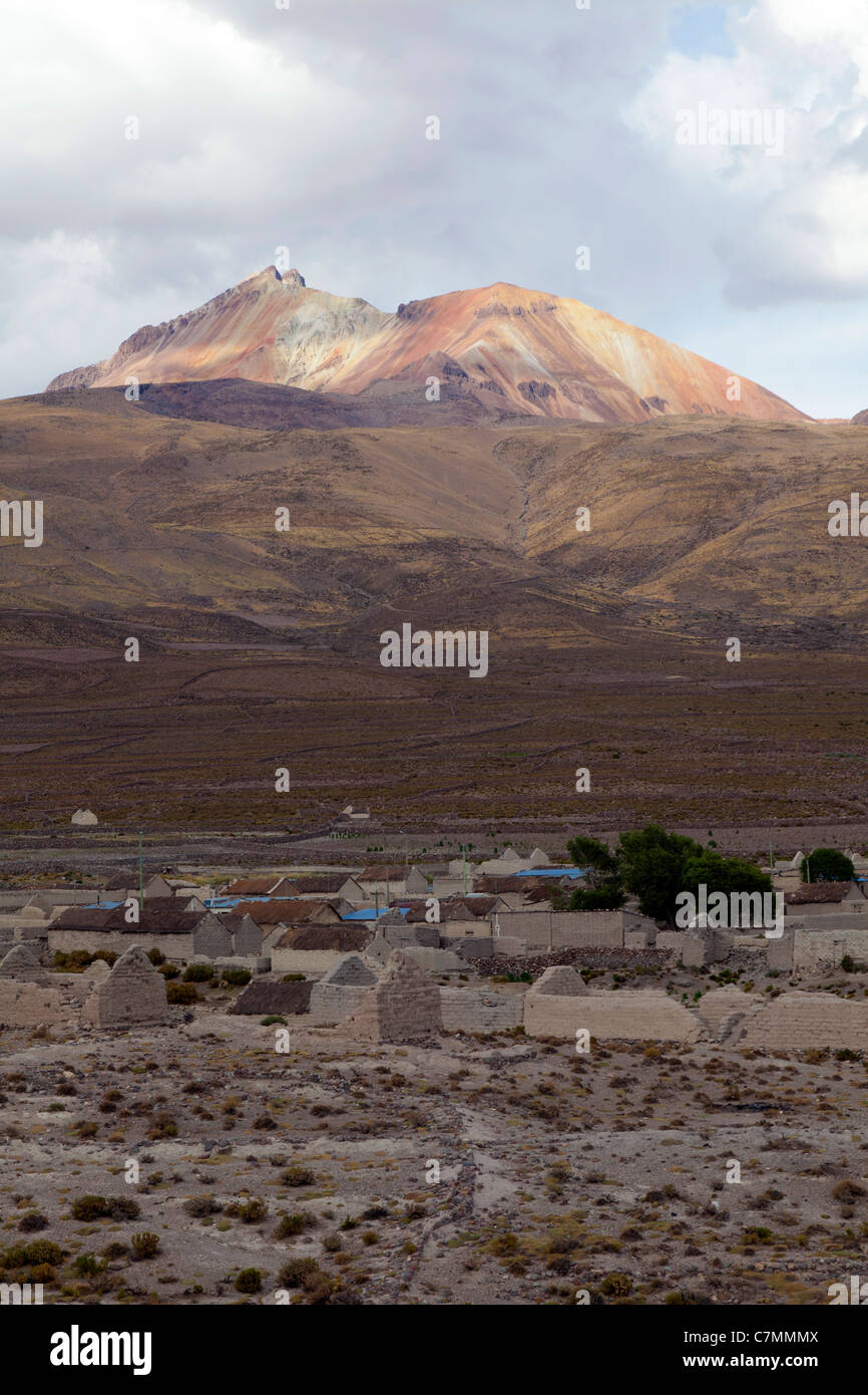 Tunupa volcano with ruined village houses at the base, Bolivia Stock ...