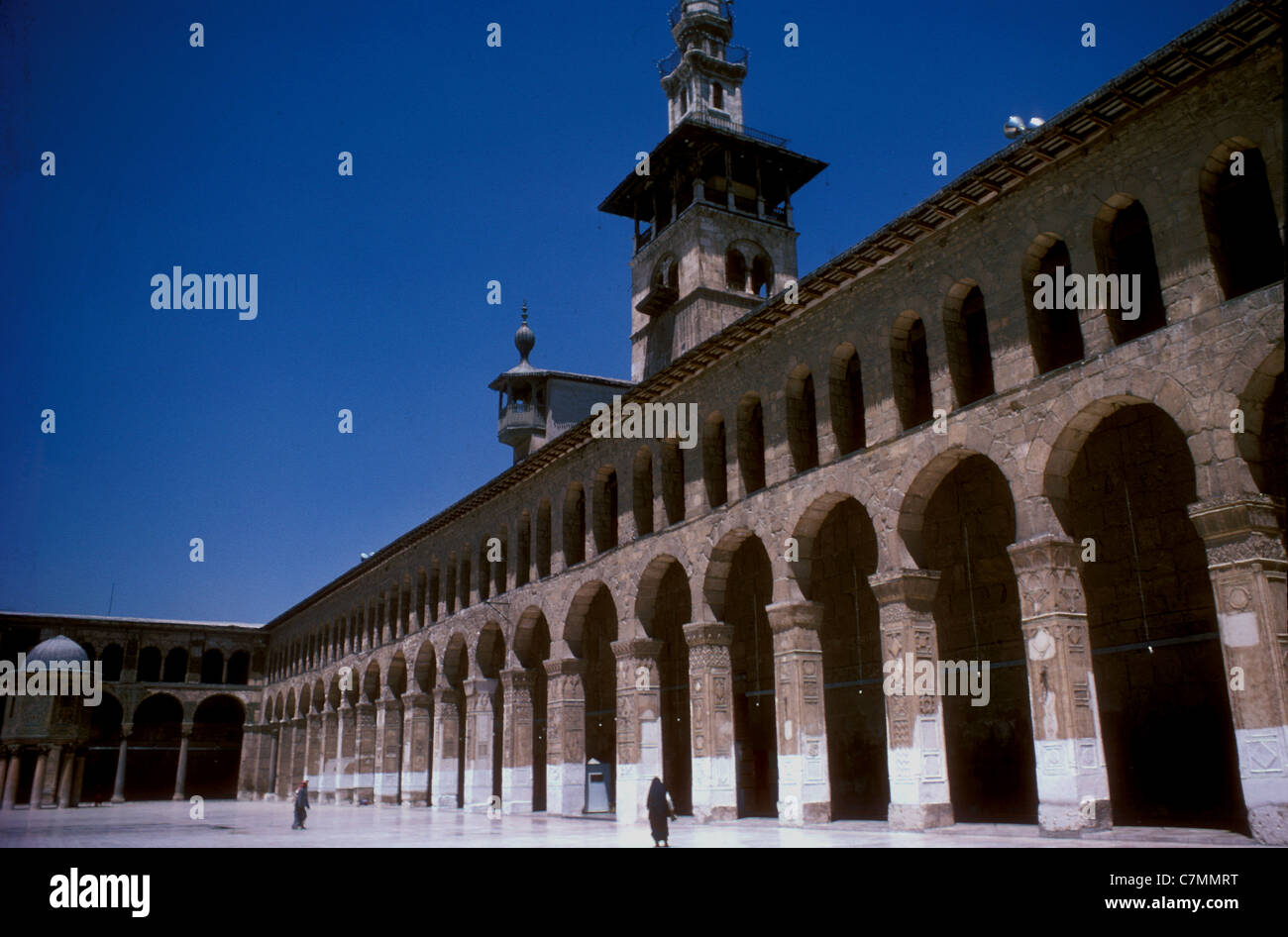 View of the arched courtyard of the Great Mosque or Umayyad Mosque in ...