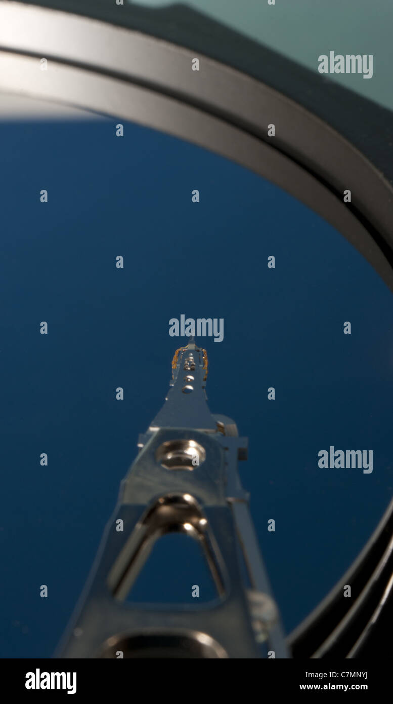 Armature and platters inside a computer hard drive Stock Photo - Alamy