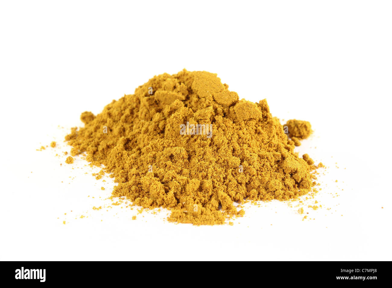 a pile of yellow, hot mixture on a white background Stock Photo - Alamy