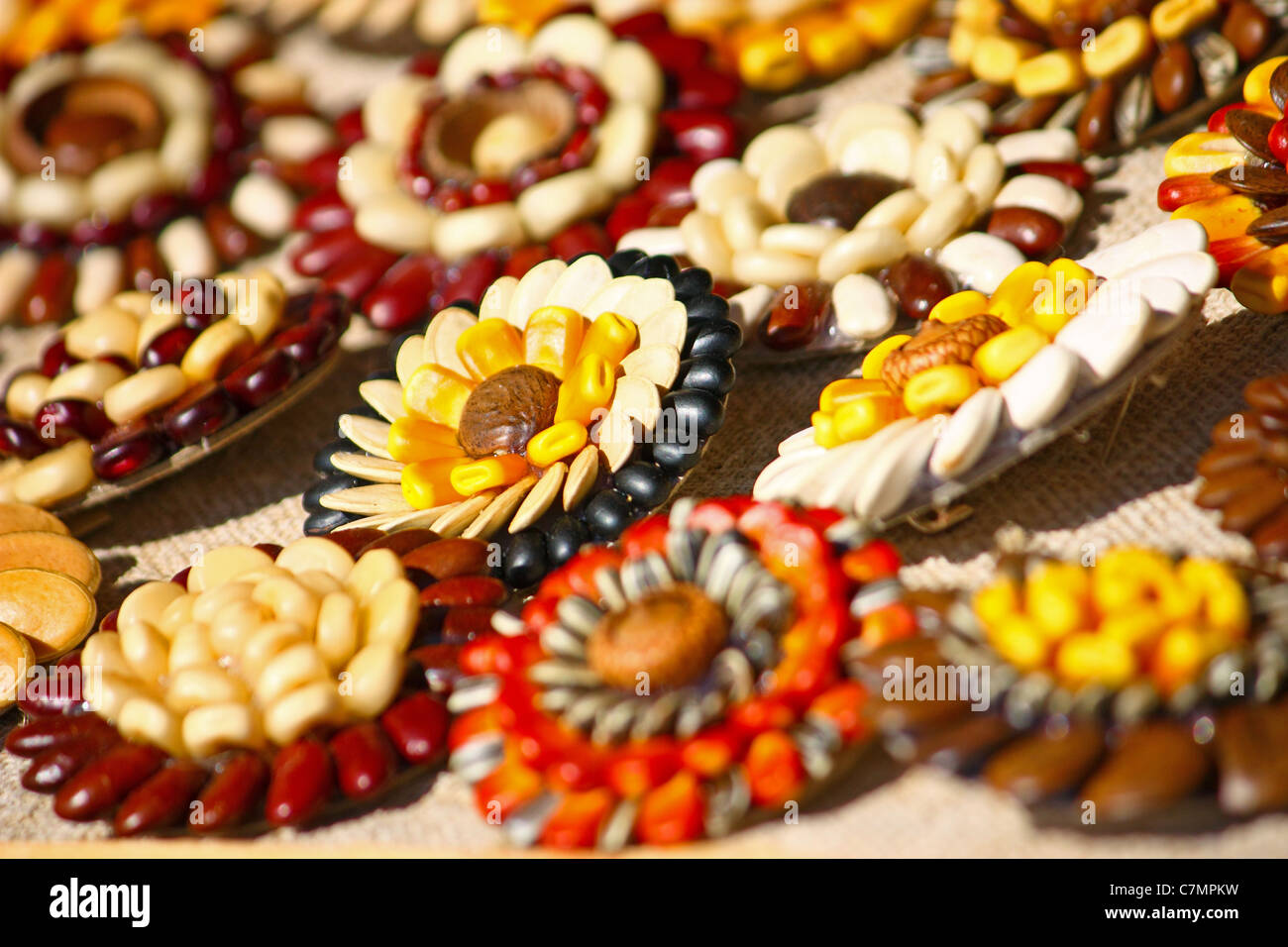 Natural decorations handmade from various seeds Stock Photo - Alamy