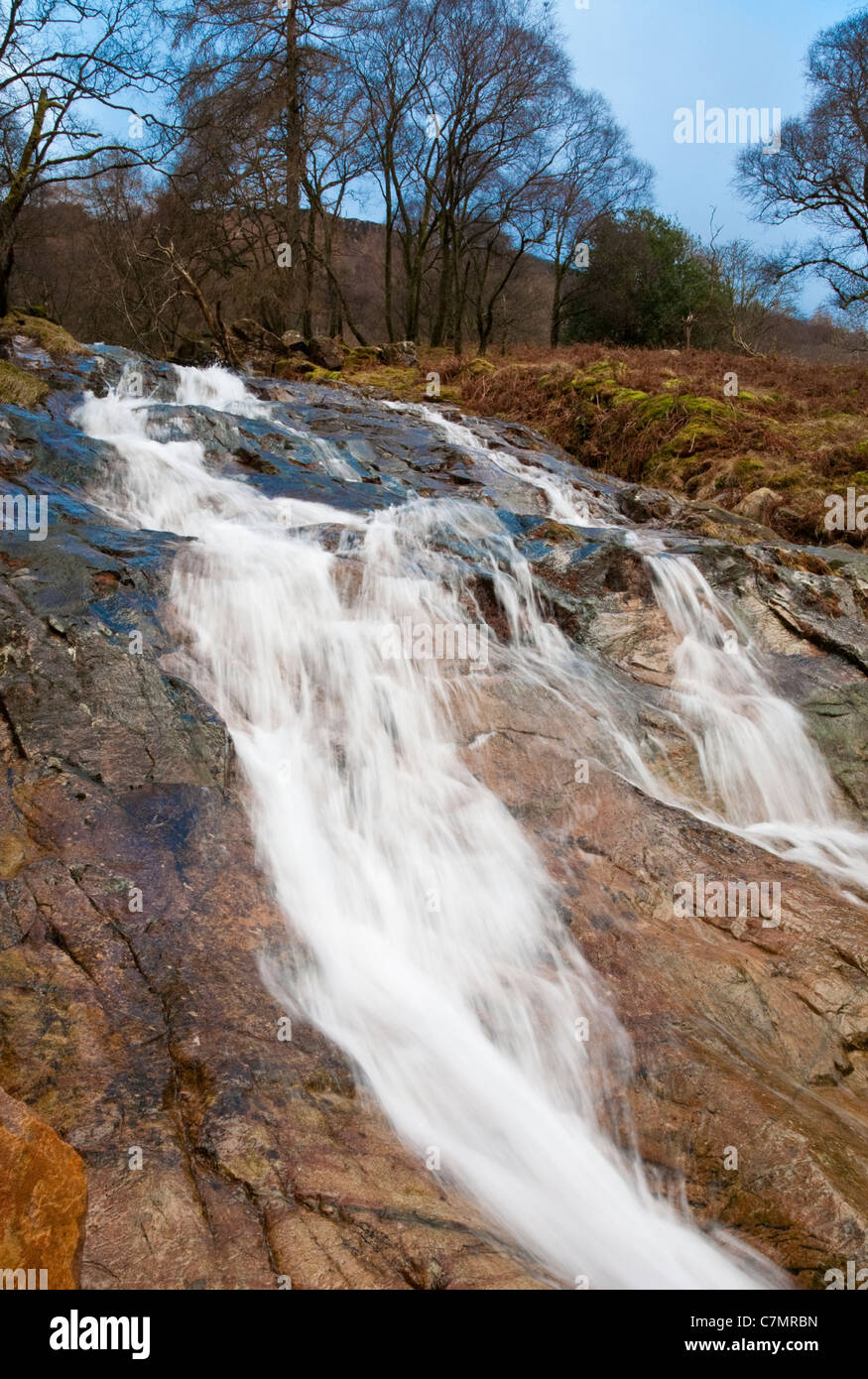Waterfall over rocks in Buttermere, Cumbria, Lake District, England. UK ...