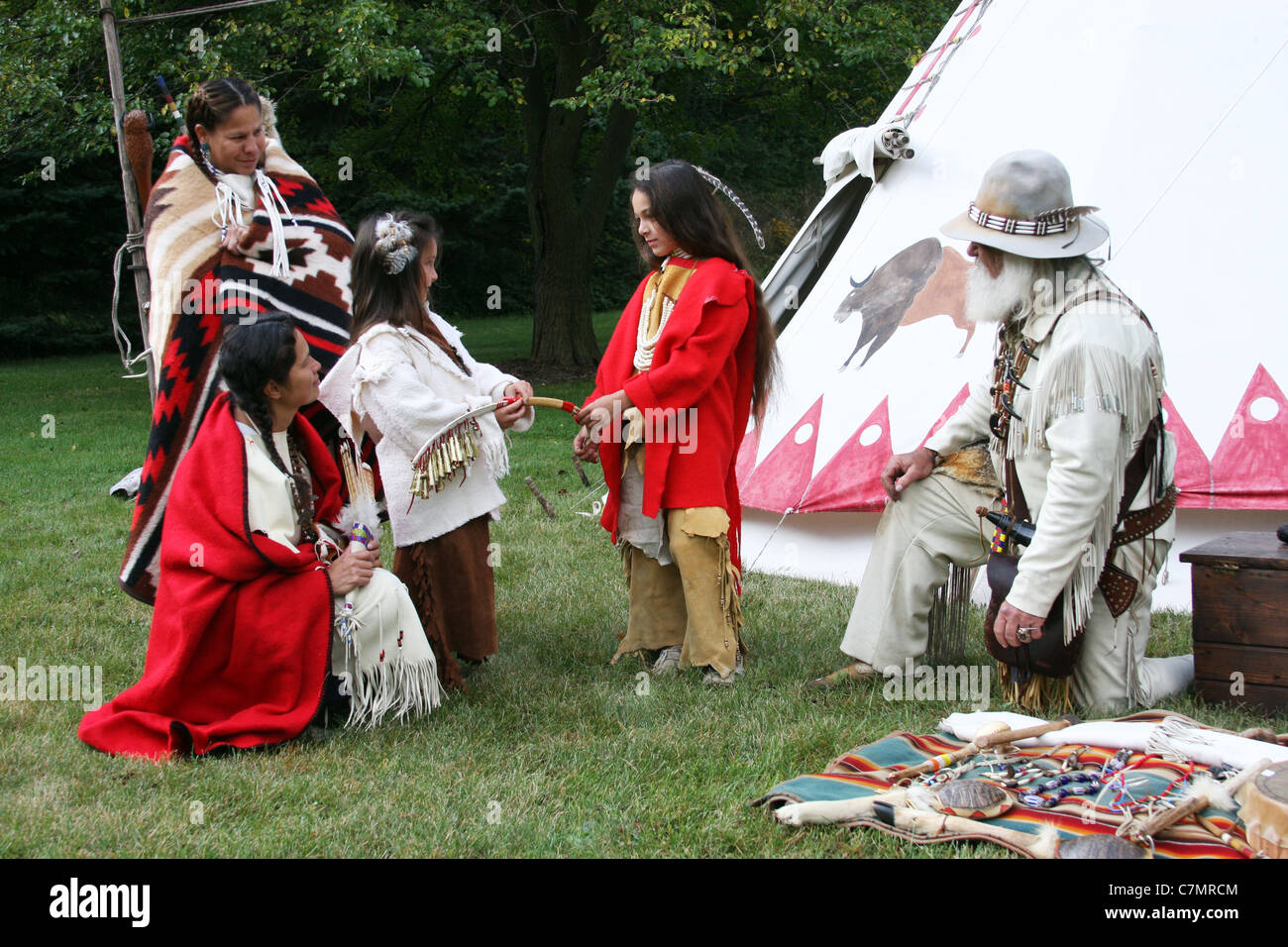 Native American Indian family and boy trading with a mountainman in ...
