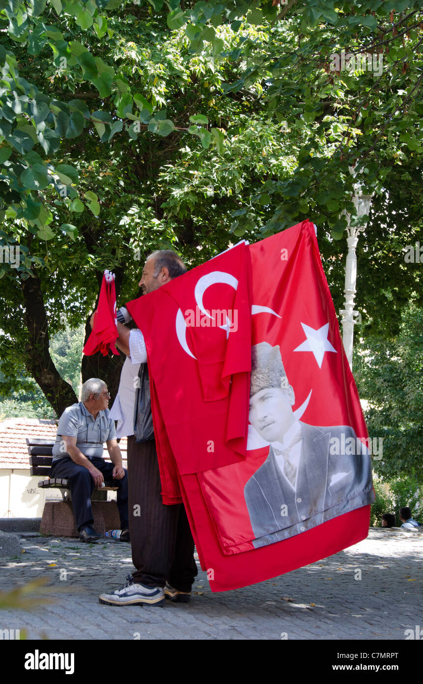 Turkey, Istanbul. Local vendor selling Turkish flags with the picture ...