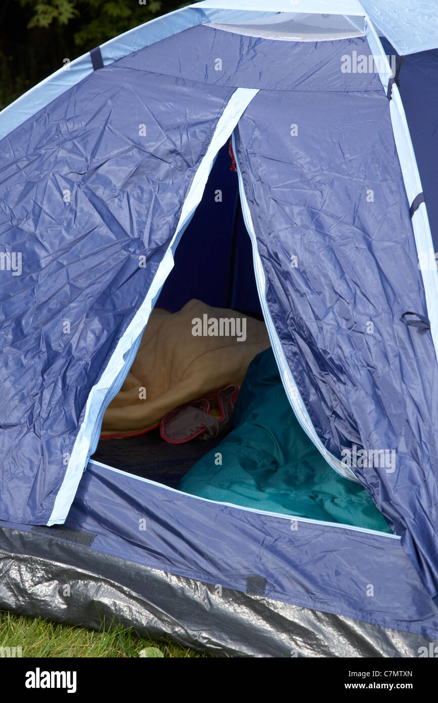 front door left open on a small dome tent Stock Photo - Alamy