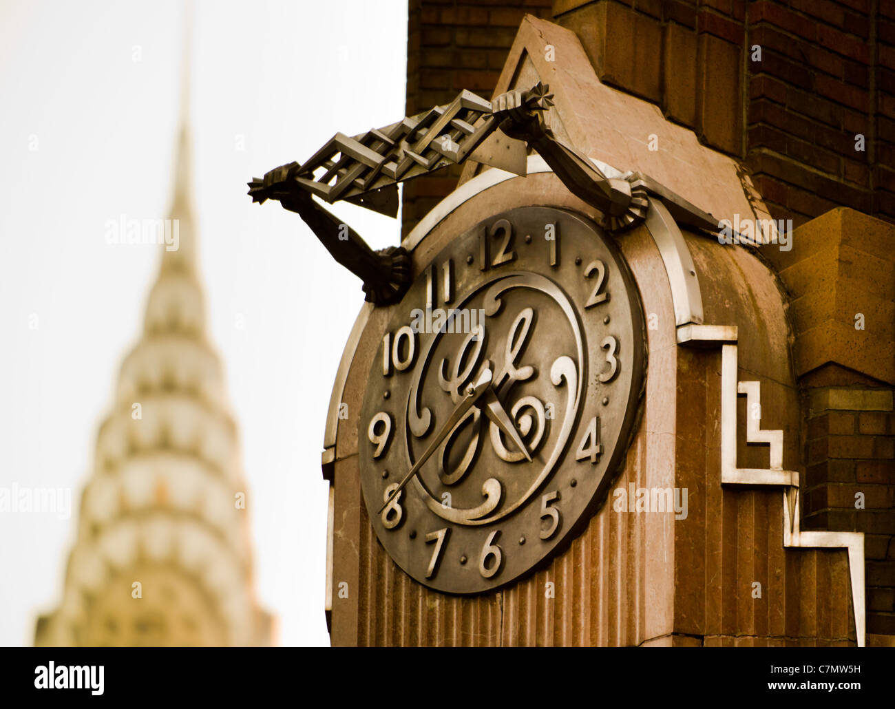 Clock on General Electric Building with Chrysler Building in background ...
