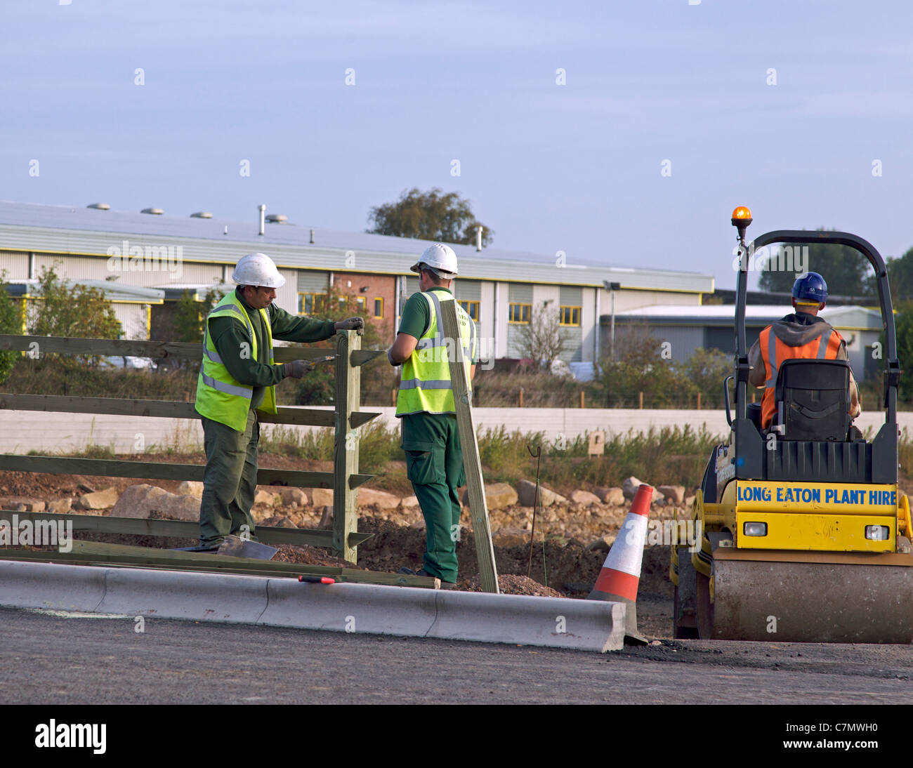building site with workers Stock Photo - Alamy