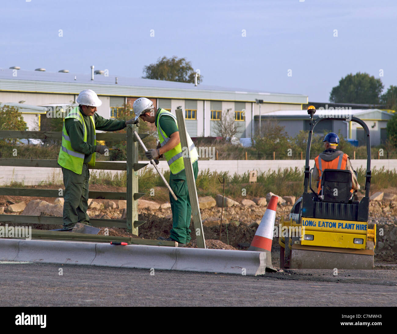 building site with workers Stock Photo - Alamy