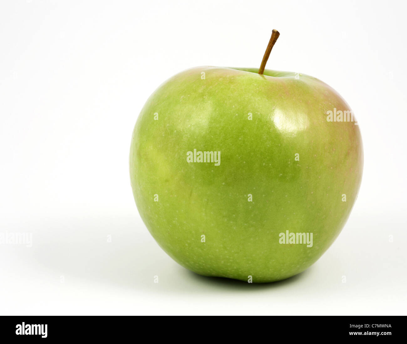 Horizontal format showing a green apple over a white background Stock ...