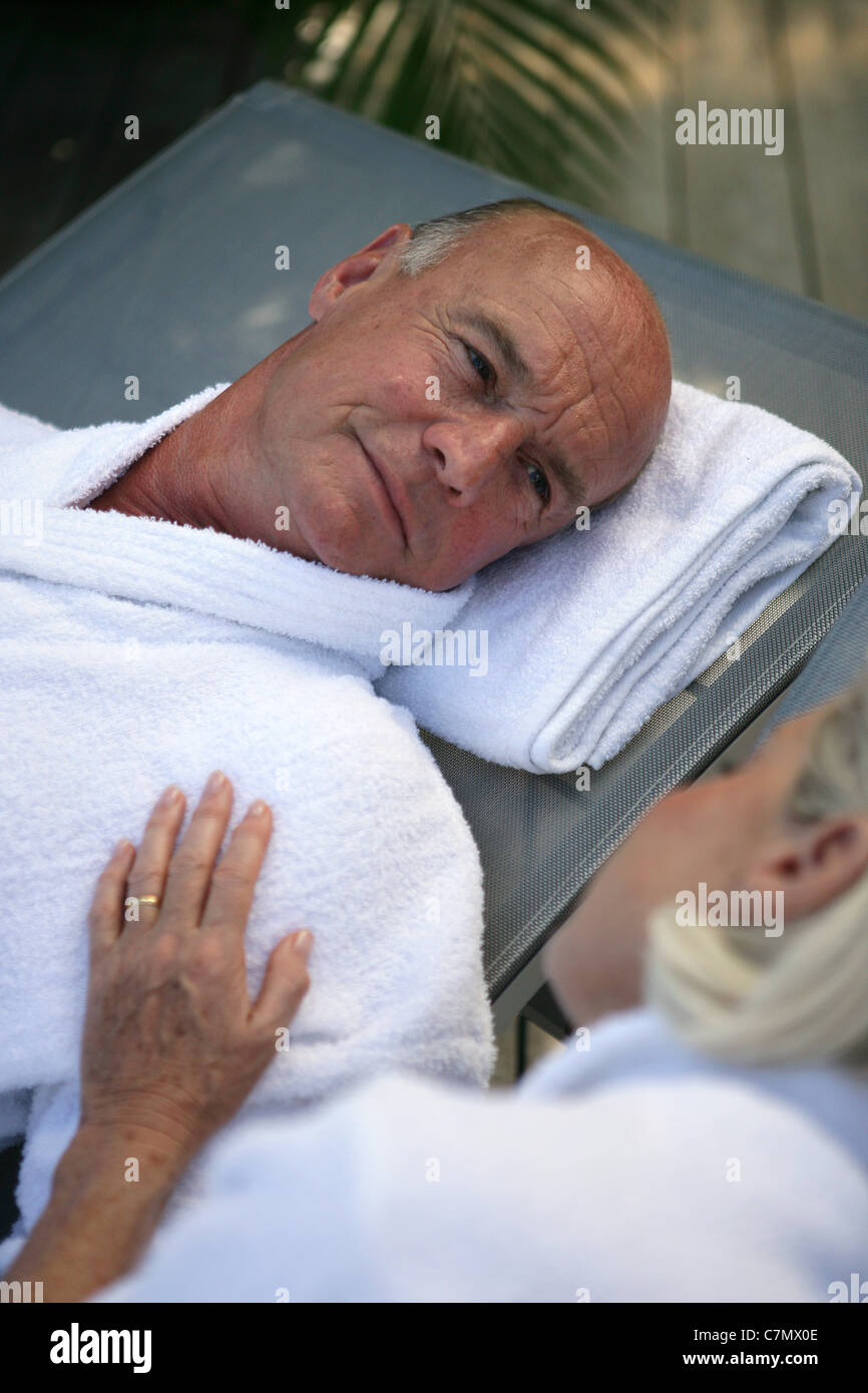 Couple relaxing at spa Stock Photo - Alamy