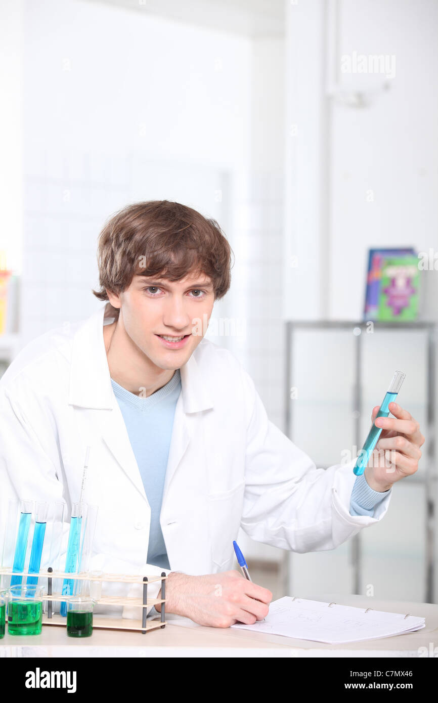 Student in chemistry lesson Stock Photo - Alamy