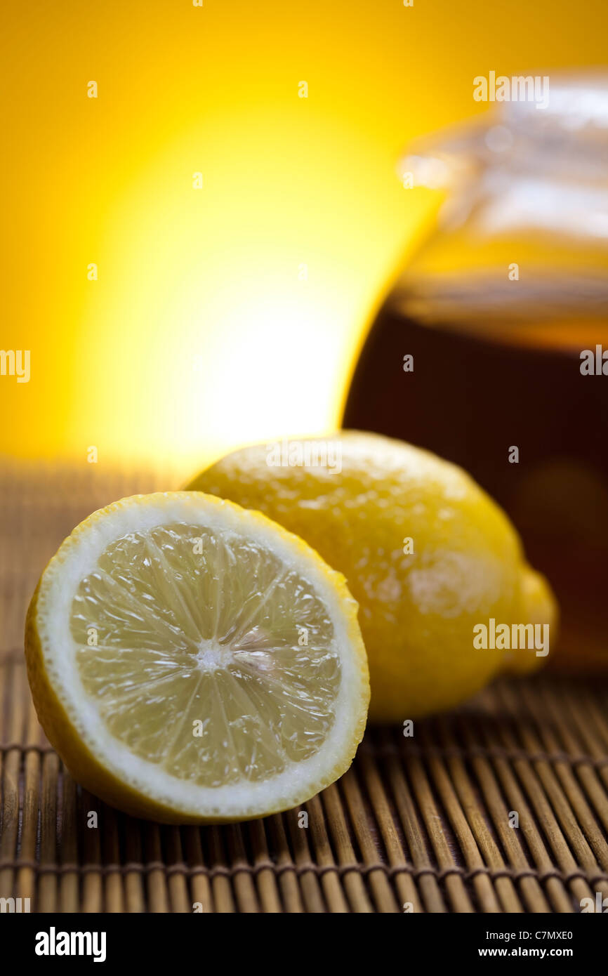 Glass teapot of tea with lemon Stock Photo - Alamy