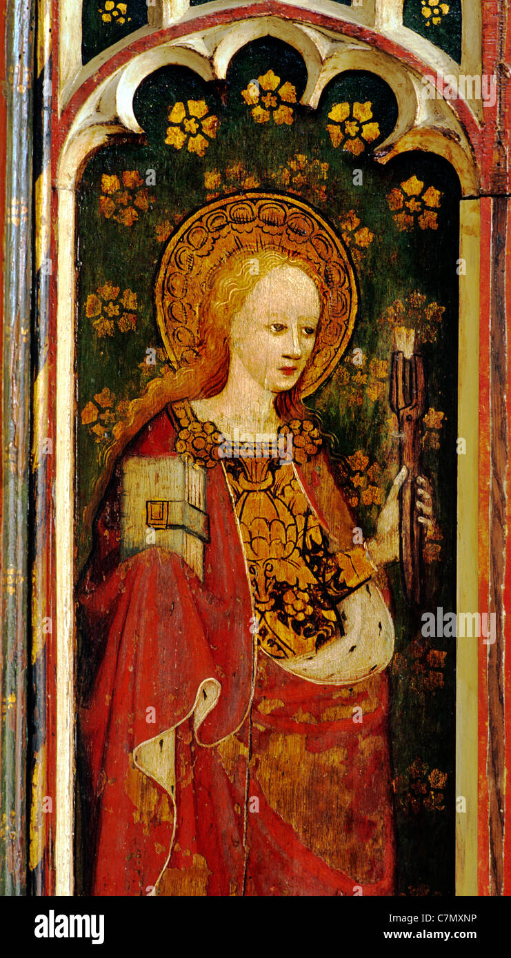 Barton Turf, Norfolk, rood screen, St. Apollonia, holding pincers and a ...