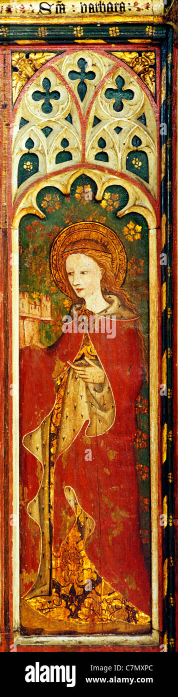 Barton Turf, Norfolk, rood screen, St. Barbara holding a castle tower ...