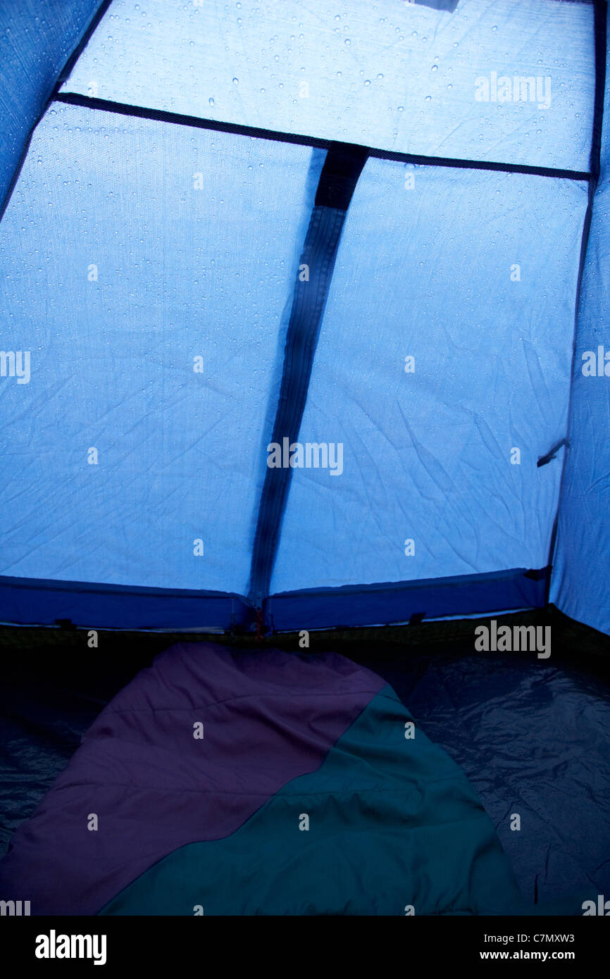 inside a rain soaked small tent Stock Photo - Alamy