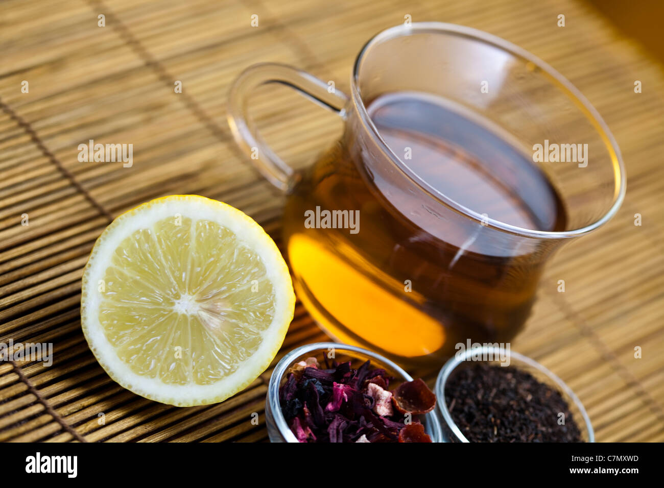 Glass cup of tea with lemon Stock Photo - Alamy