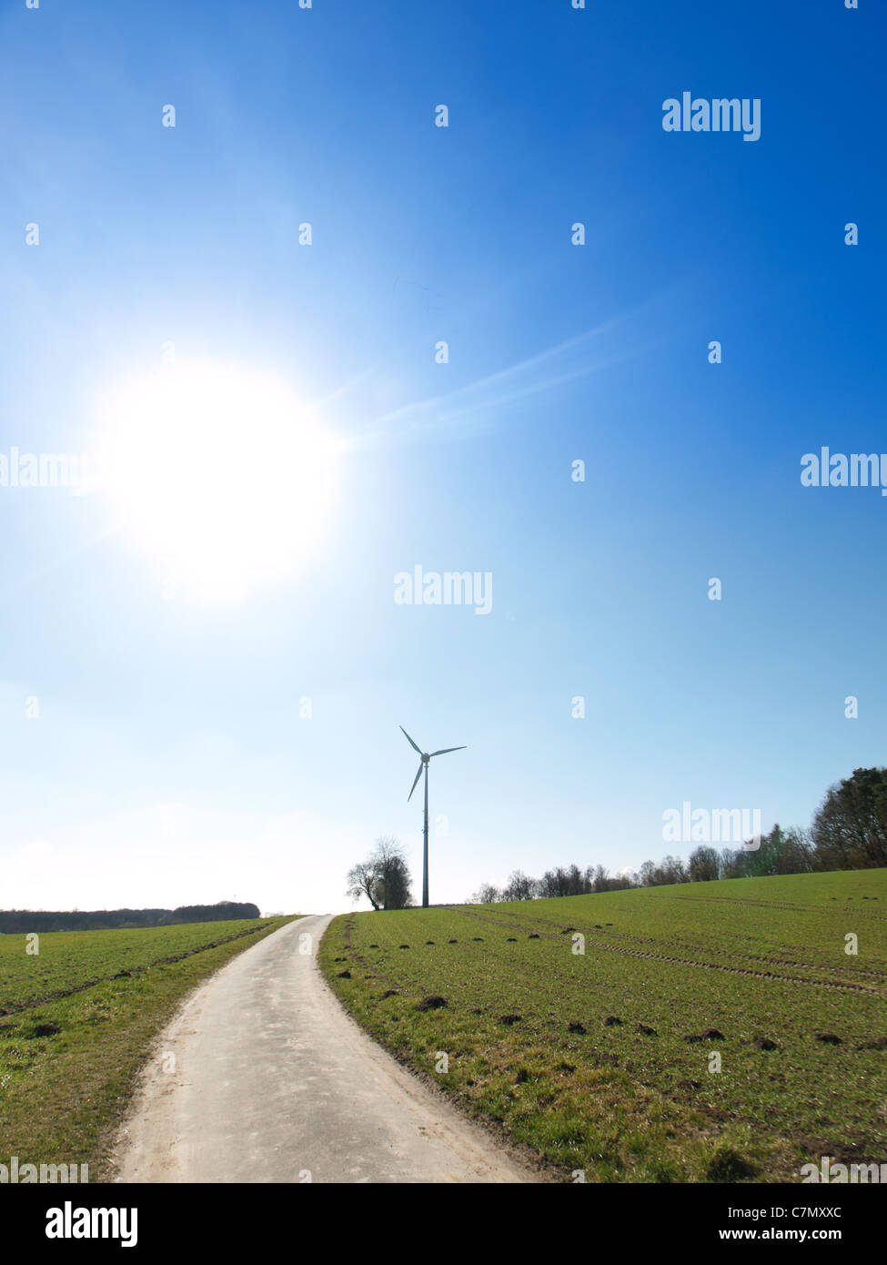Wind turbine and sun Stock Photo - Alamy
