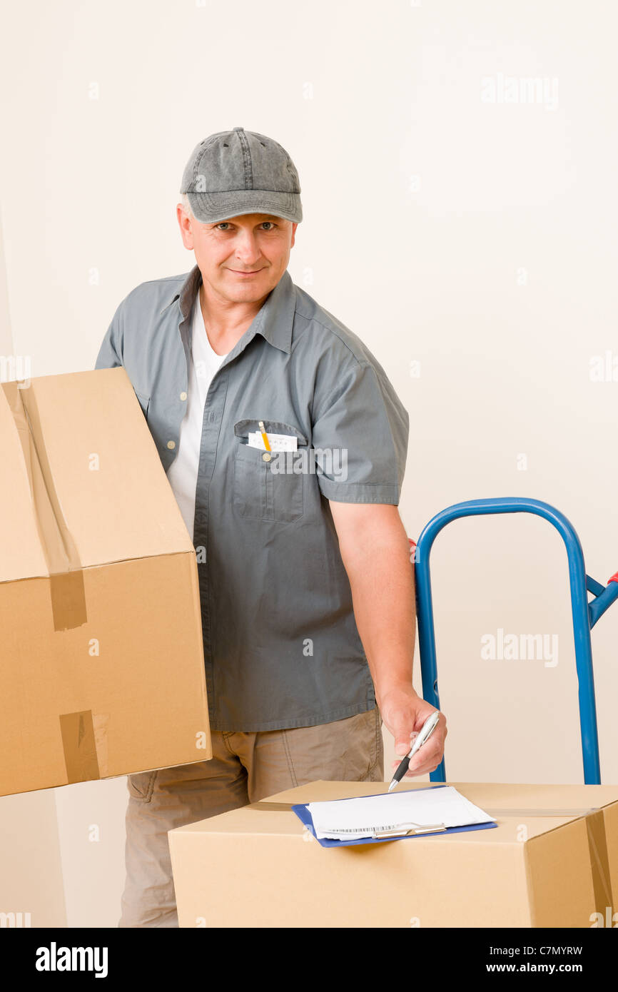 Messenger mature male courier delivering parcel boxes. Shipping and ...